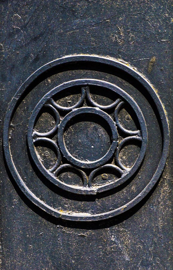 Beautiful Forged Symbol on a Lamppost Stock Image - Image of scratched ...