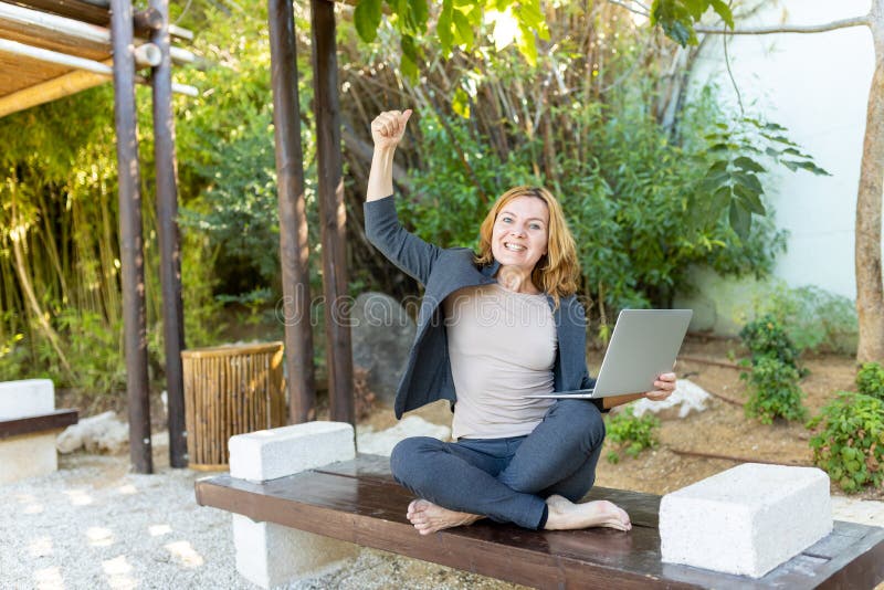 A Beautiful Freelancer Woman Works at the Park Stock Photo - Image of ...