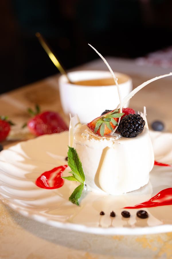 A Beautiful Fresh White Dessert in a Restaurant on the Table. Original ...