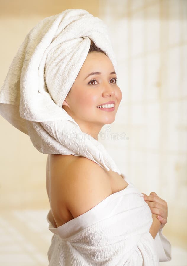 Beautiful Fresh Young Girl Wearing White Bathrobe And A Towel In Her