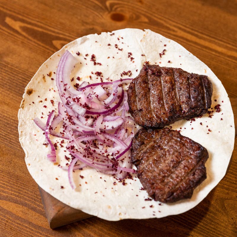 Beautiful fried beef meal stock photo. Image of dark - 190244412