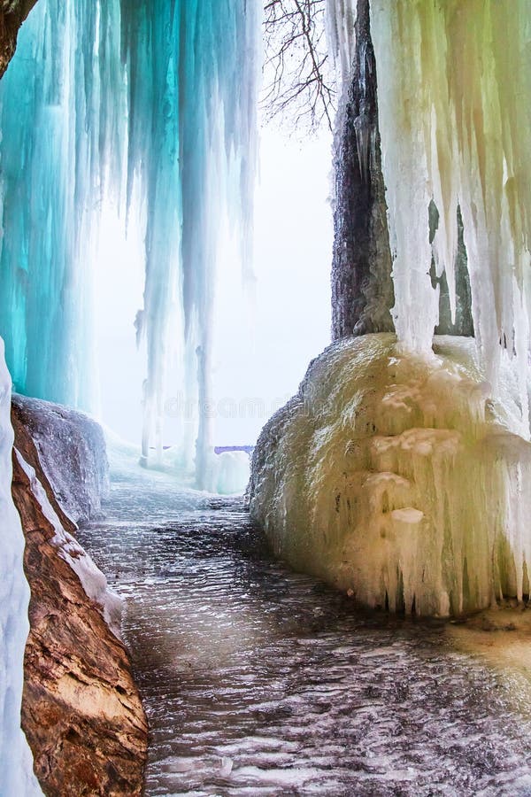 Beautiful Frozen Ice Formations and Icicles of Blue in Cave Stock Image ...