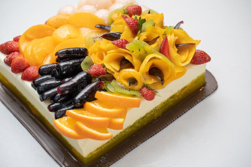 Beautiful Fruit Pudding with Strawberries, Mango, Oranges and Grapes ...