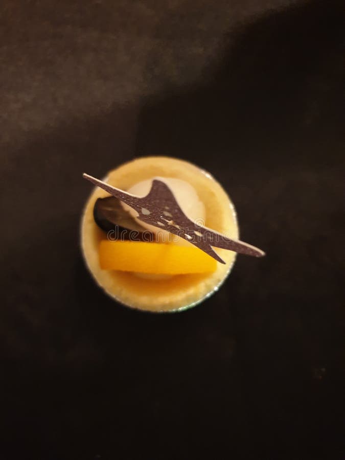 The Beautiful Fruit Tart with Chocolate Star Cookies on the Top Stock ...