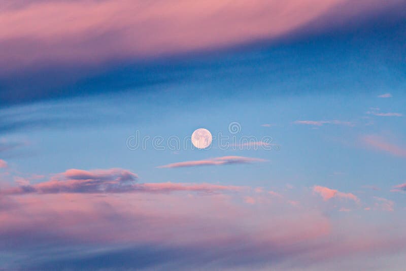 A Beautiful Full Moon at Dusk among Clouds Stock Photo - Image of ...