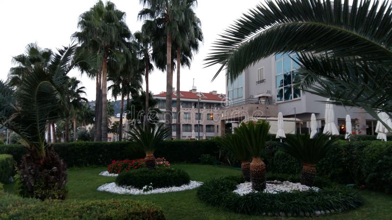Beautiful Garden in Front of the Hotel Editorial Stock Image - Image of ...