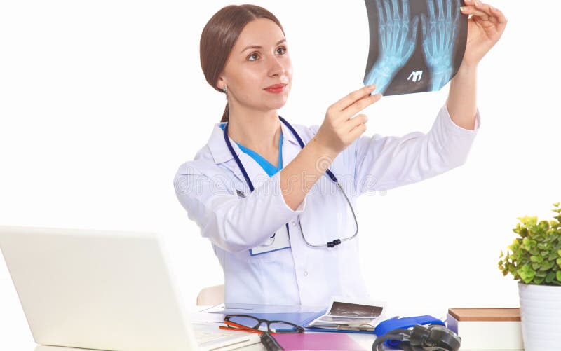 Beautiful General Practitioner is Working with Joy. she is Standing ...