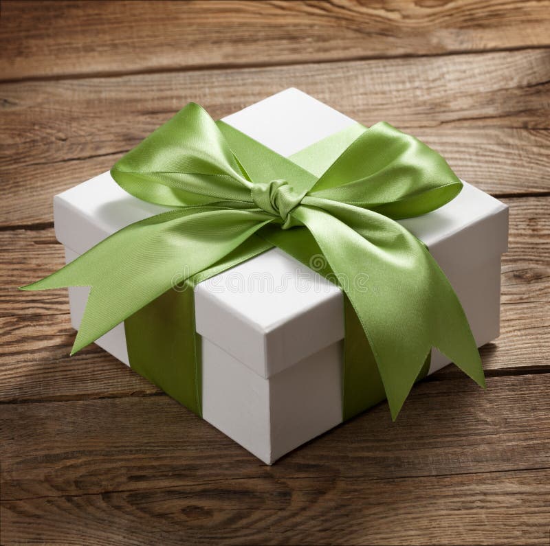 Beautiful Gift Box with a Bow on the Table from the Old Boards Stock ...