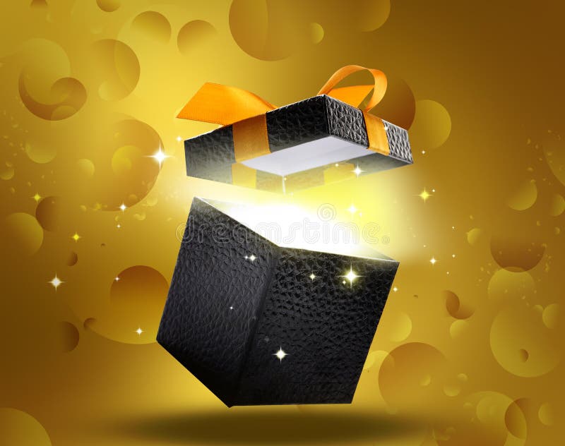 Beautiful Gift Box with Magic Light on Golden Background Stock Photo ...