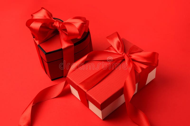 Beautiful Gift Boxes with Bows on Red Background Stock Image - Image of ...