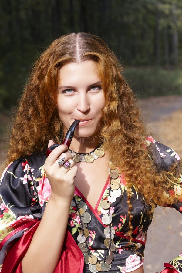 A Beautiful Ginger-haired Girl in Gipsy Suit Stock Photo - Image of ...
