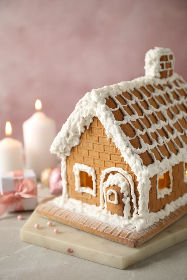 Beautiful Gingerbread House Decorated with Icing on Table Stock Photo ...