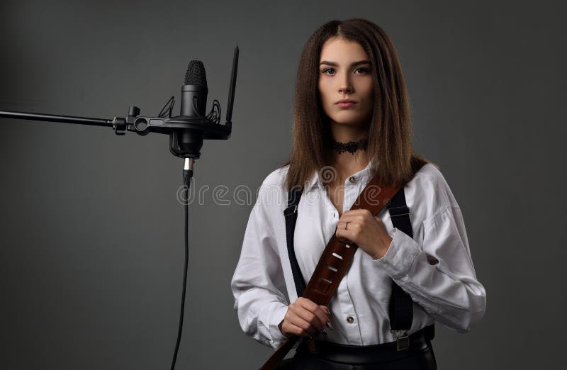 Beautiful Girl on the Background of a Studio Microphone Stock Image ...