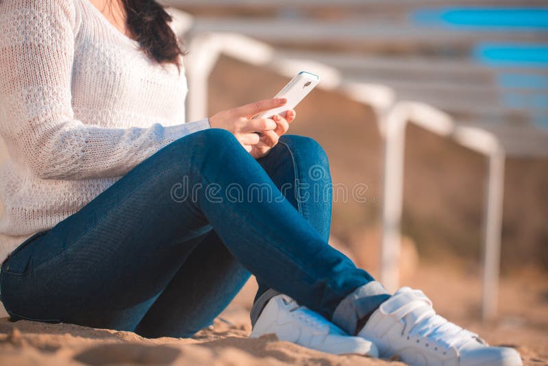 Beautiful Girl on the Beach with Cellphone Stock Image - Image of beach ...