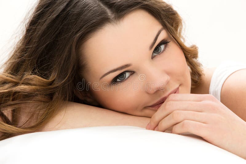 Beautiful girl in the bed stock image. Image of closeup - 38413749