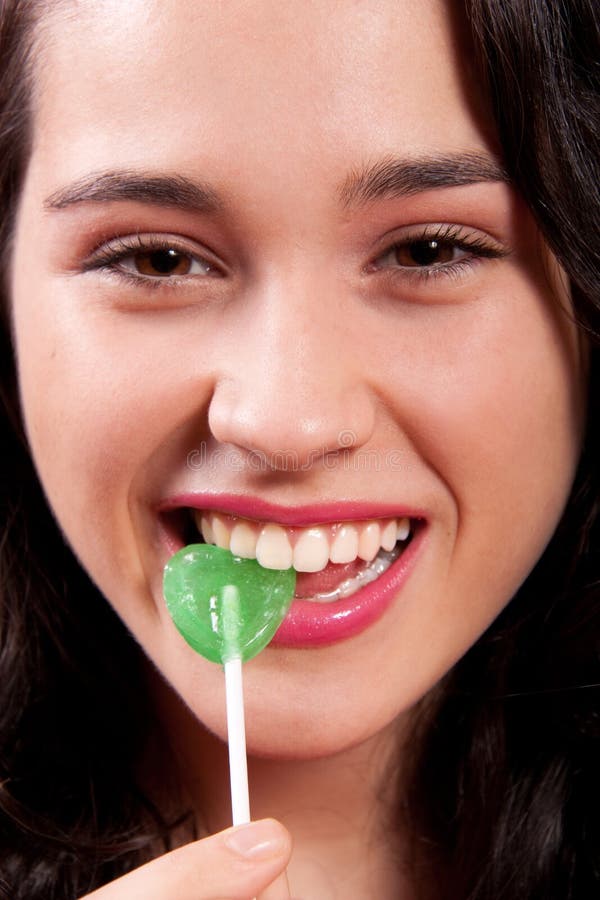 Beautiful Girl Biting a Heart Shaped Candy Stock Image - Image of girl ...