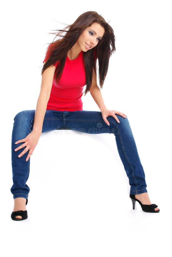 Beautiful Girl in Blue Jeans Stock Photo - Image of sitting, brunette ...