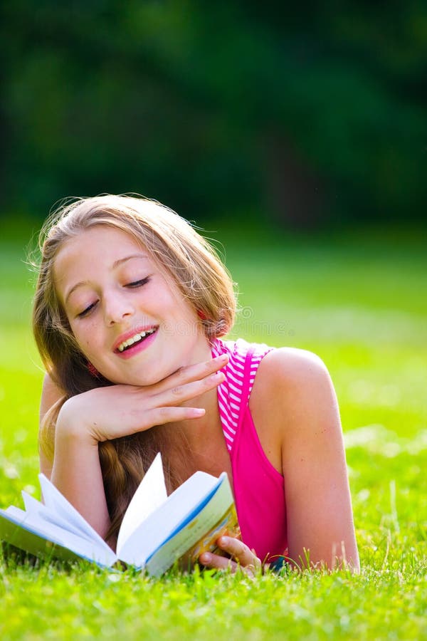 Beautiful girl with book stock photo. Image of nature - 15001652
