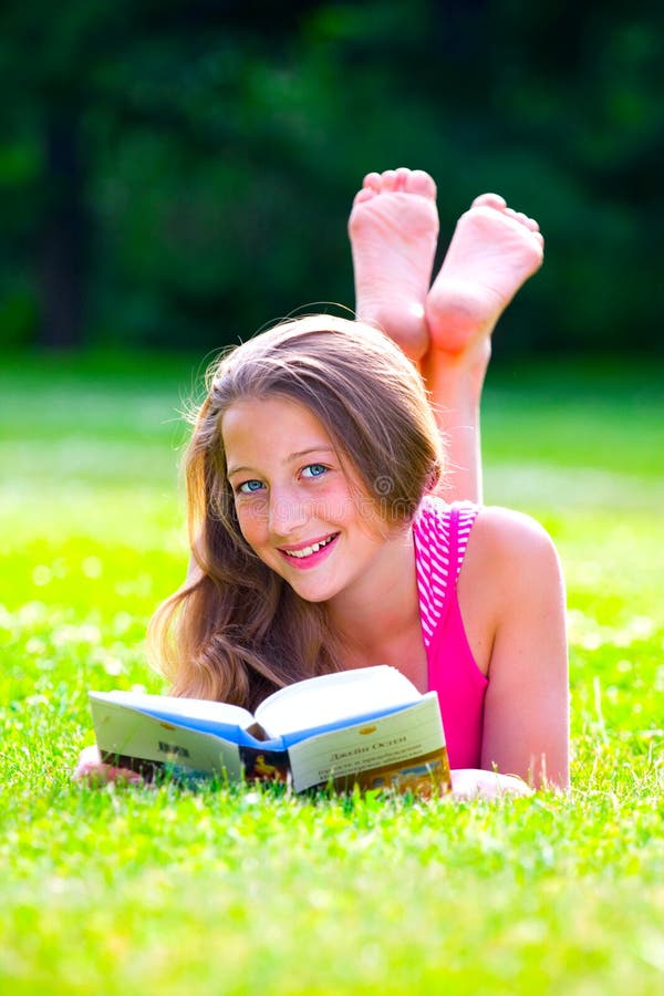Beautiful girl with book stock image. Image of green - 15001667