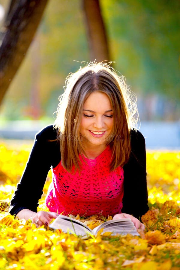 Beautiful girl with book stock photo. Image of park, beauty - 16315714