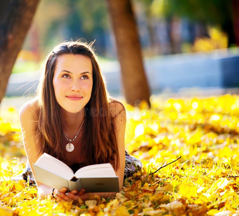 Beautiful girl with book stock photo. Image of attractive - 16437776