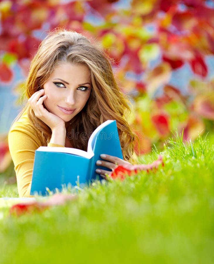 Beautiful girl with book stock photo. Image of leaves - 29248172