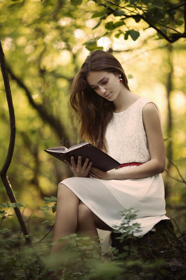 Beautiful Girl with Book in the Forest Stock Photo - Image of open ...