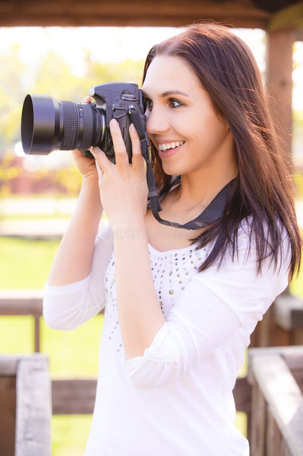 Pretty Female Photographer Outdoors Stock Image - Image of background ...