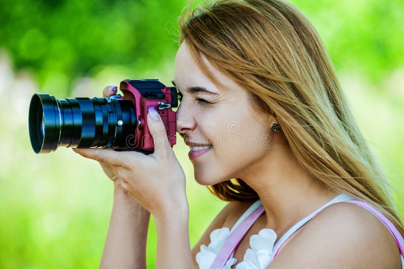 Beautiful girl with camera stock photo. Image of paparazzo - 65064660
