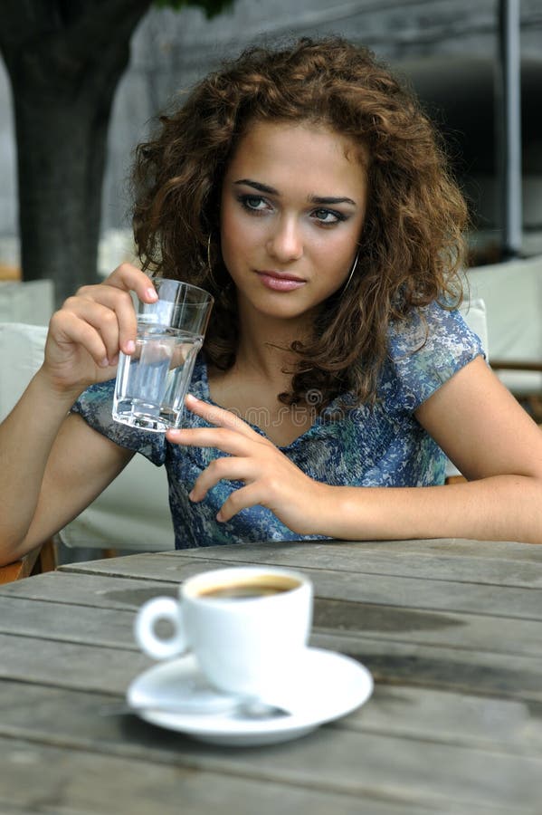 Beautiful girl with coffee stock photo. Image of attractive - 12991232