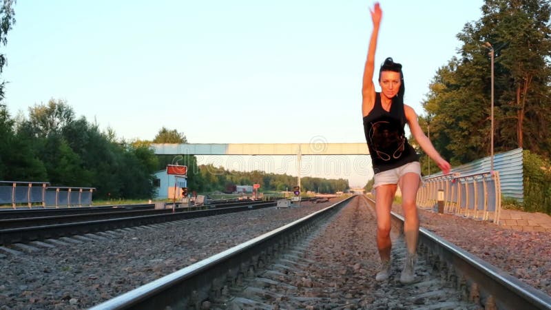 Beautiful Girl Dances on the Railway Track at Stock Video - Video of ...