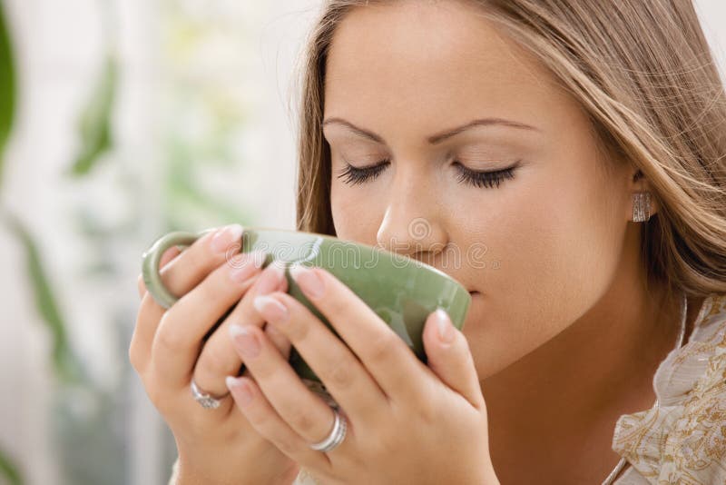 Beautiful Girl Drinking Tea Stock Image - Image of caucasian, blonde ...