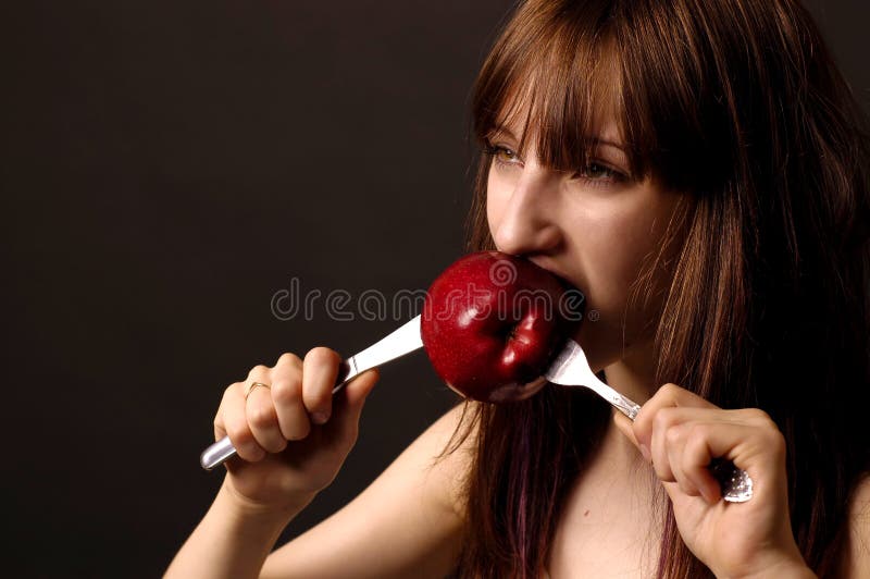 Beautiful Girl is Eating the Red Apple with Appeti Stock Image - Image ...