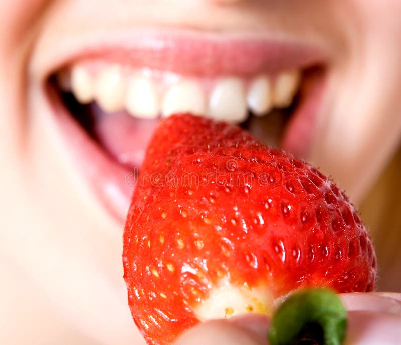 Girl Eating a Strawberry 02 Stock Photo - Image of fruit, adult: 2722796