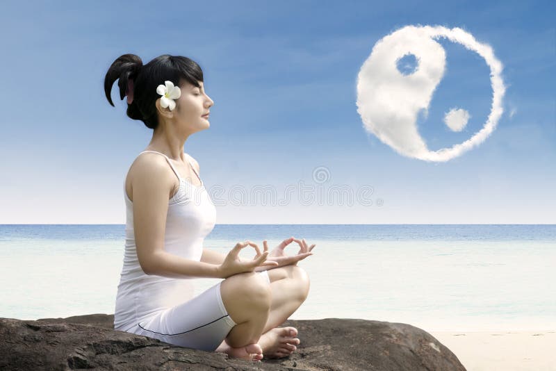 Beautiful Girl Exercise Yoga at Beach Under Ying Yang Cloud Stock Photo ...