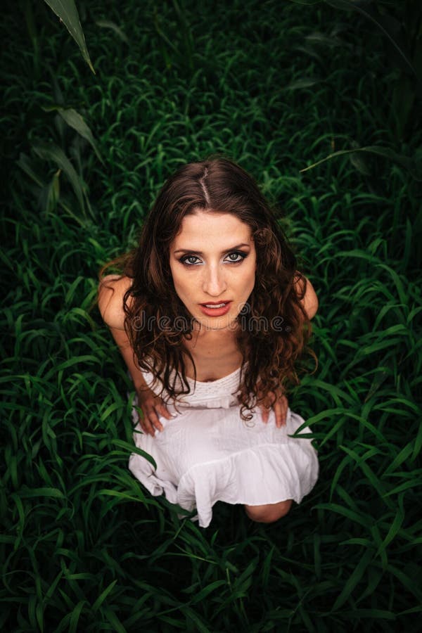 Beautiful Girl in a Field of Cobs Stock Image - Image of field, earth ...