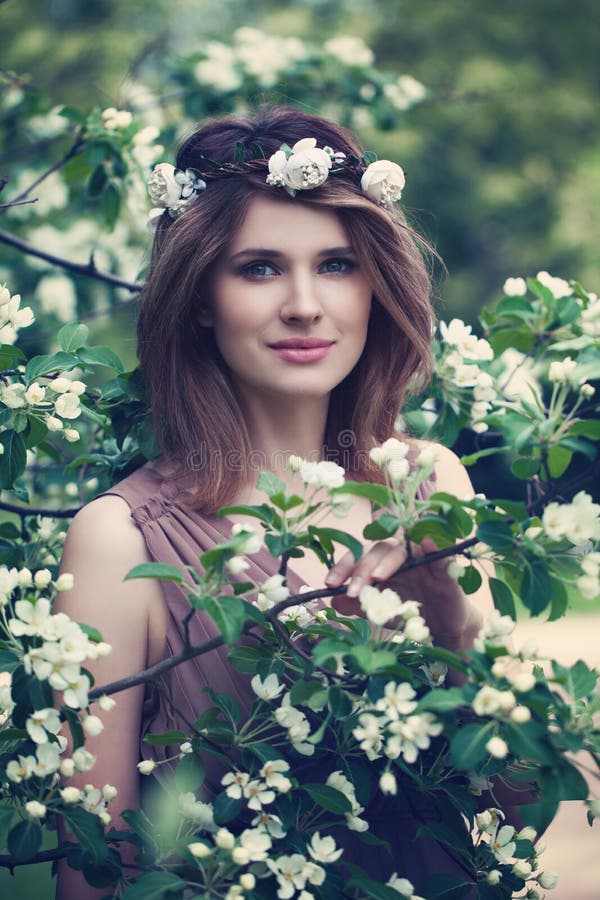 Beautiful Girl with Flowers Stock Image - Image of dreams, beauty: 87157083