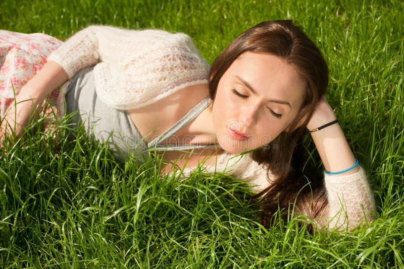 Beautiful girl on grass stock photo. Image of hair, beauty - 20042458