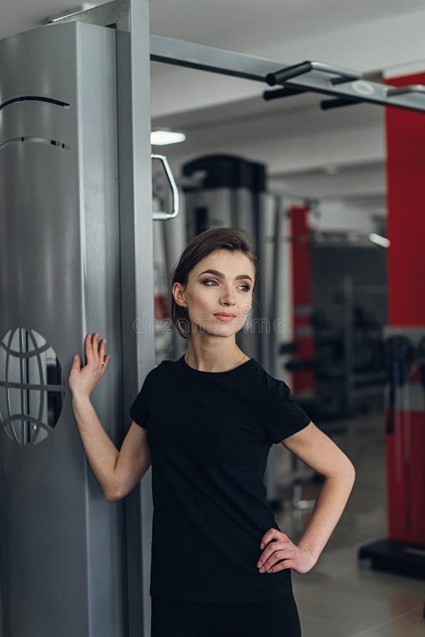 Beautiful girl at the gym stock image. Image of beauty - 68584019
