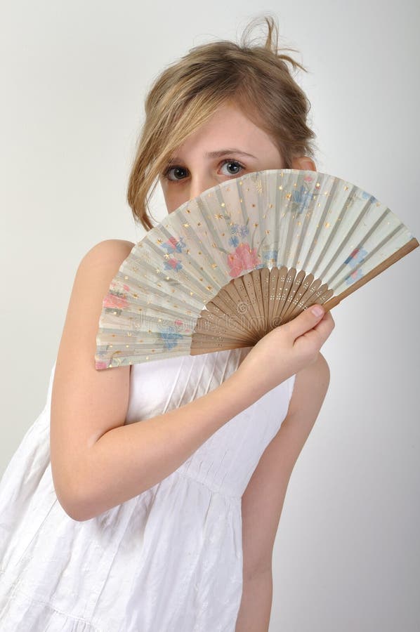 Beautiful Girl Hiding Behind a Fan Stock Image - Image of playing ...