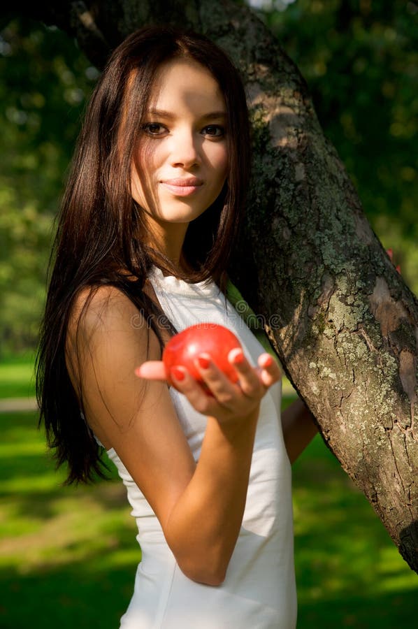 Beautiful Girl Holding a Red Apple Stock Photo - Image of apple ...