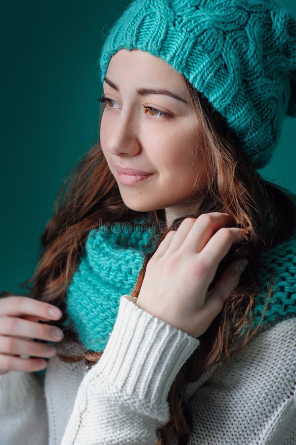 Beautiful Girl in a Knitted Hat Looking Out the Window Stock Photo ...