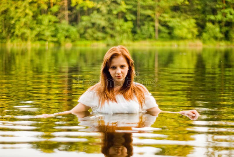 Beautiful girl in the lake stock image. Image of sensual - 47094741