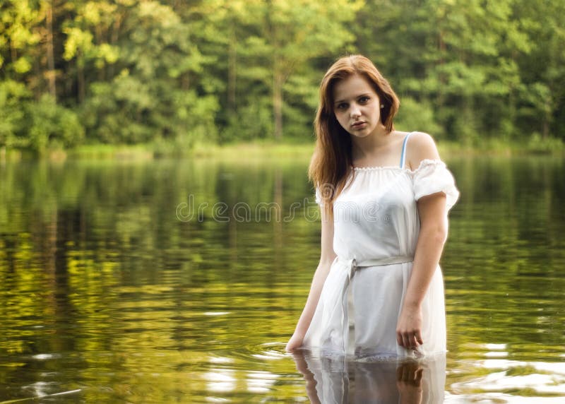 Beautiful girl in the lake stock photo. Image of summer - 47190942