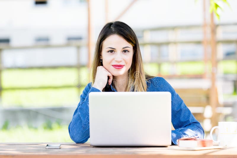Beautiful Girl with Laptop Looking Towards Camera Stock Photo - Image ...