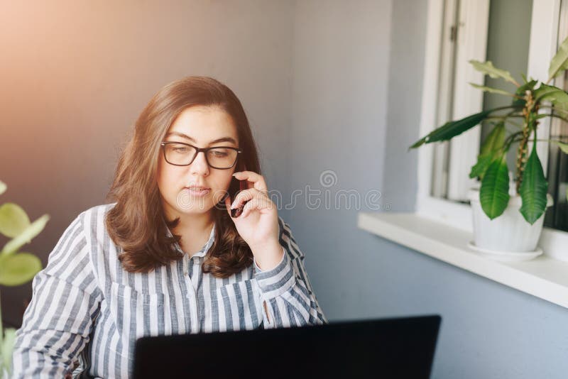 Beautiful Girl on a Laptop Working at Home Stock Photo - Image of ...