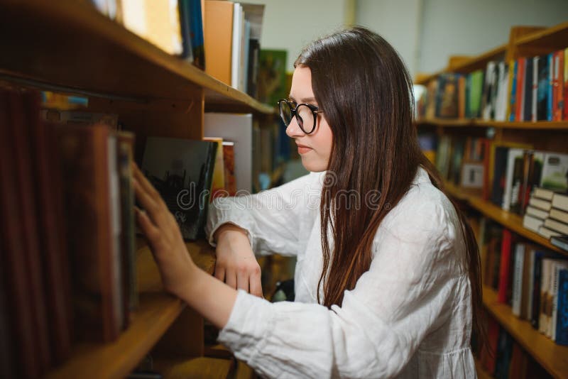 Beautiful Girl in a Library Stock Image - Image of attractive, library ...