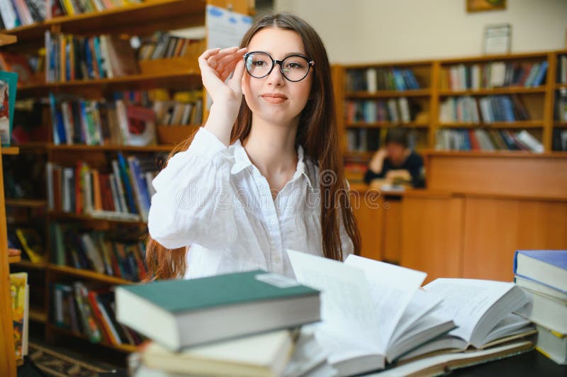 Beautiful Girl in a Library Stock Photo - Image of happy, girl: 249594238