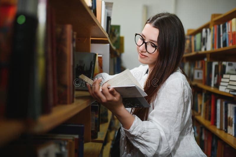 Beautiful Girl in a Library Stock Image - Image of happy, teenager ...