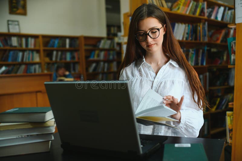 Beautiful Girl in a Library Stock Photo - Image of bookshelf, indoor ...